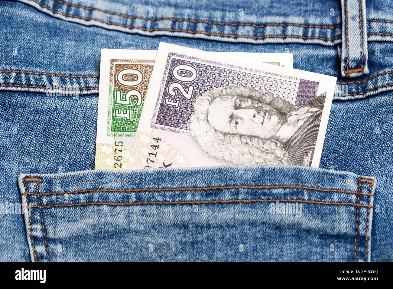 Scottish money - pound in the pocket of blue jeans Stock Photo - Alamy