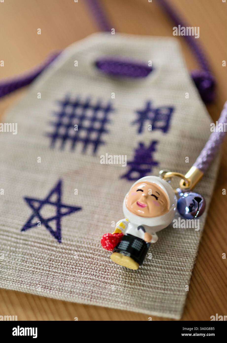 Photo shows a good luck charm and amulet on sale at the Shinmei Shrine ...