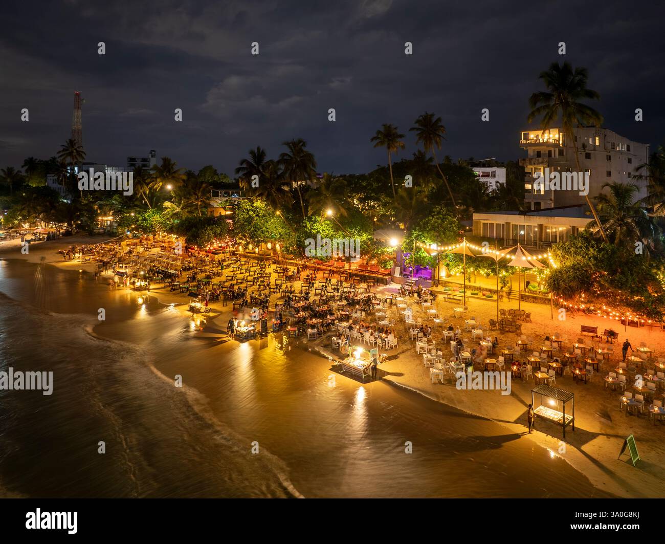 Aerial night photo about the beach restaurants in Mirissa Beach Matara ...