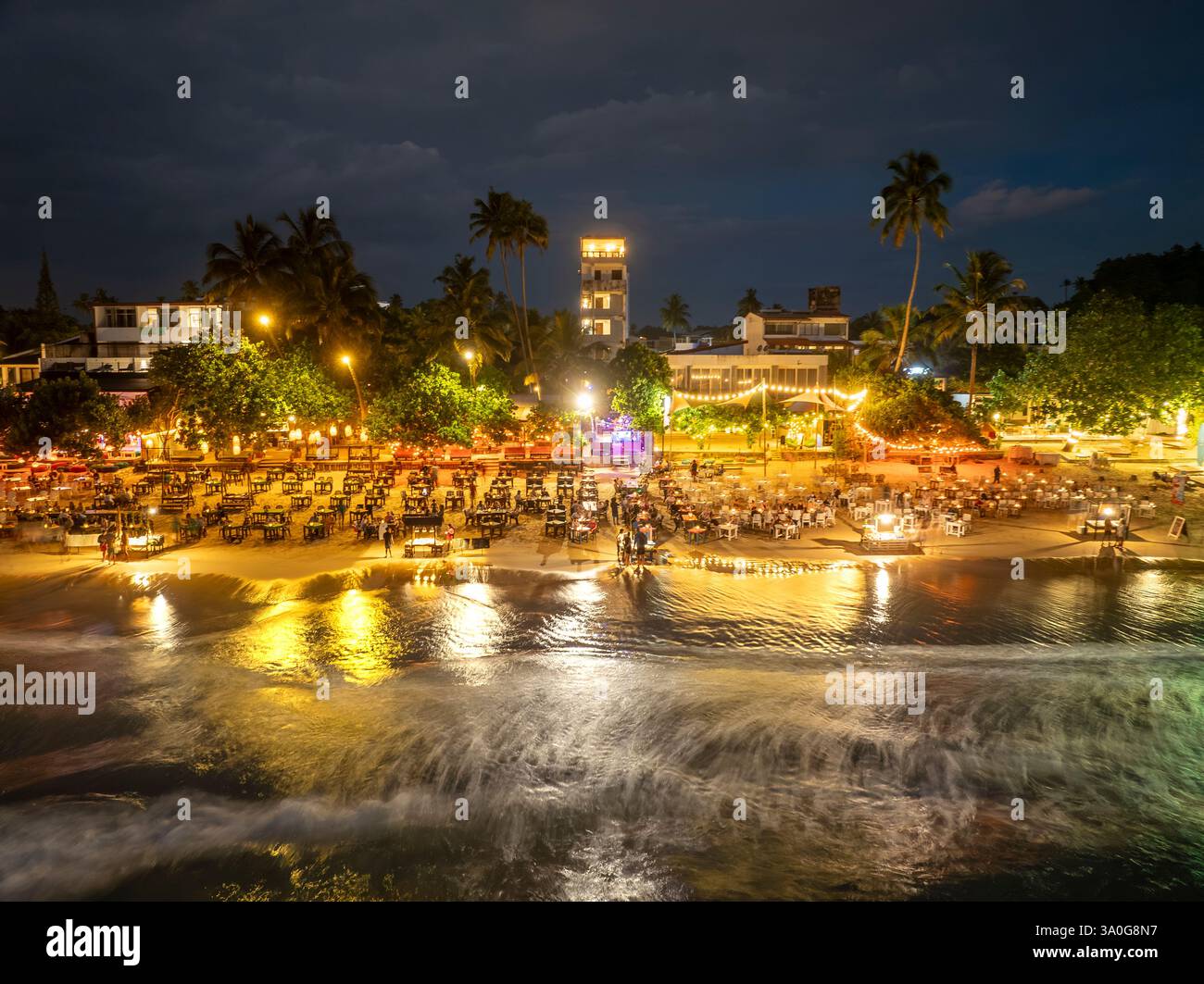 Aerial night photo about the beach restaurants in Mirissa Beach Matara ...