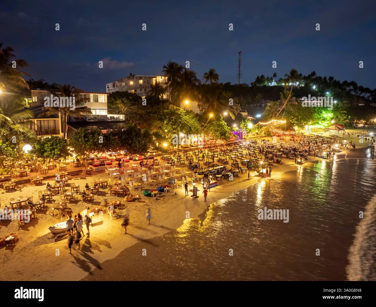 Aerial night photo about the beach restaurants in Mirissa Beach Matara ...