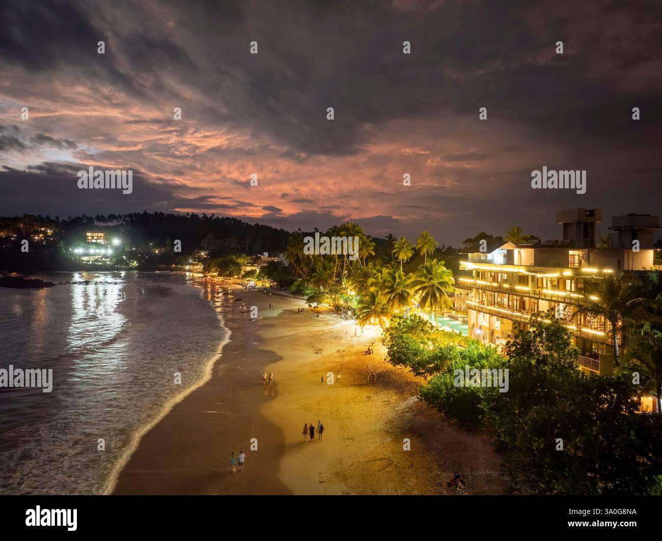 Aerial night photo about the beach restaurants in Mirissa Beach Matara ...