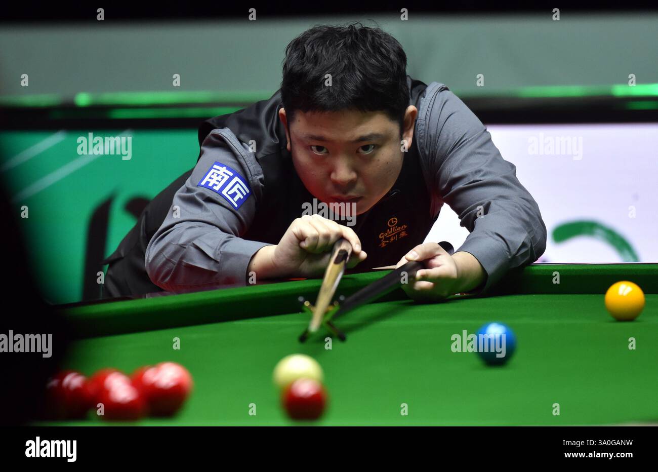 Hong Kong, China. 4th Mar, 2025. Zhang Anda competes during the match ...