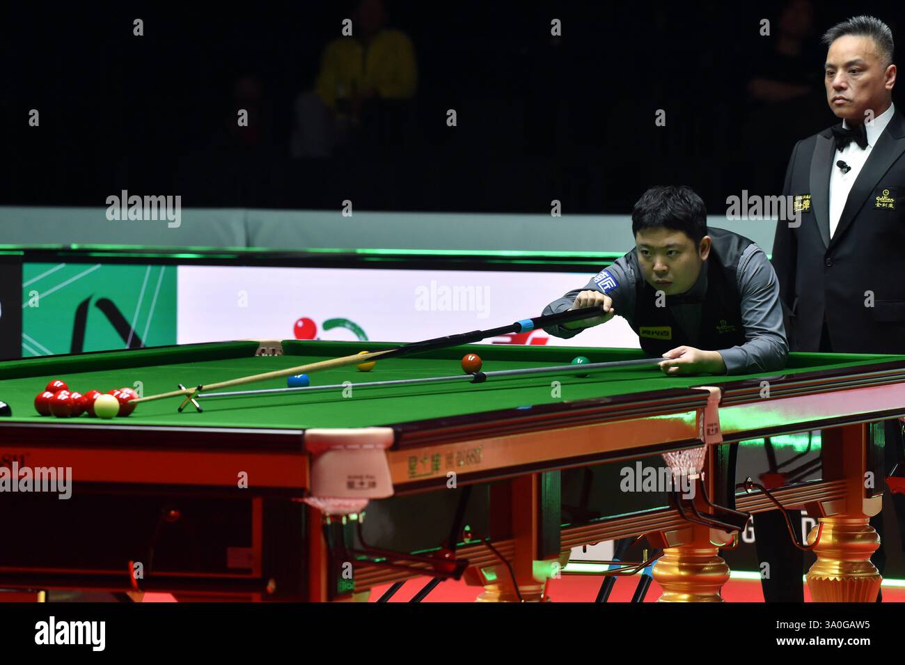 Hong Kong, China. 4th Mar, 2025. Zhang Anda (L) competes during the ...