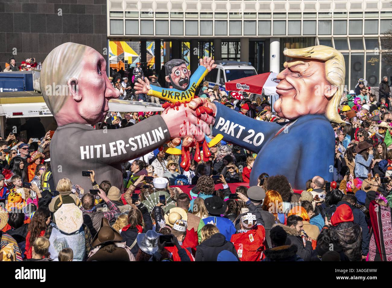 Rose Monday parade in Duesseldorf, themed float by float builder Jacques Tilly, Putin and Trump ...