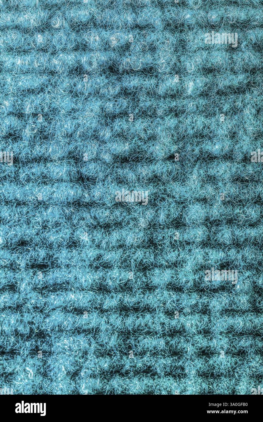 Blue dishwashing kitchen sponge vertical image Stock Photo - Alamy