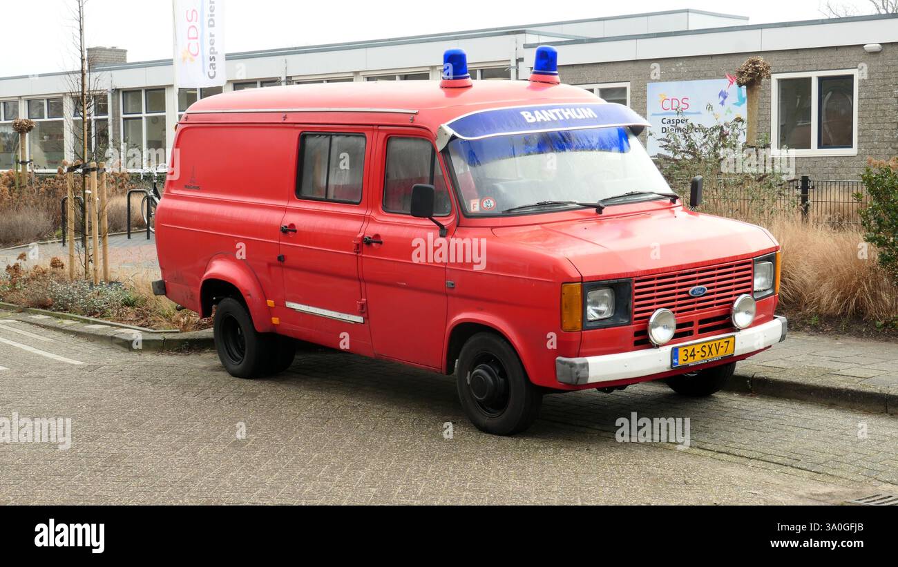 Bergentheim, Netherlands - Feb 6 2025 - A red vintage Ford Transit Van ...