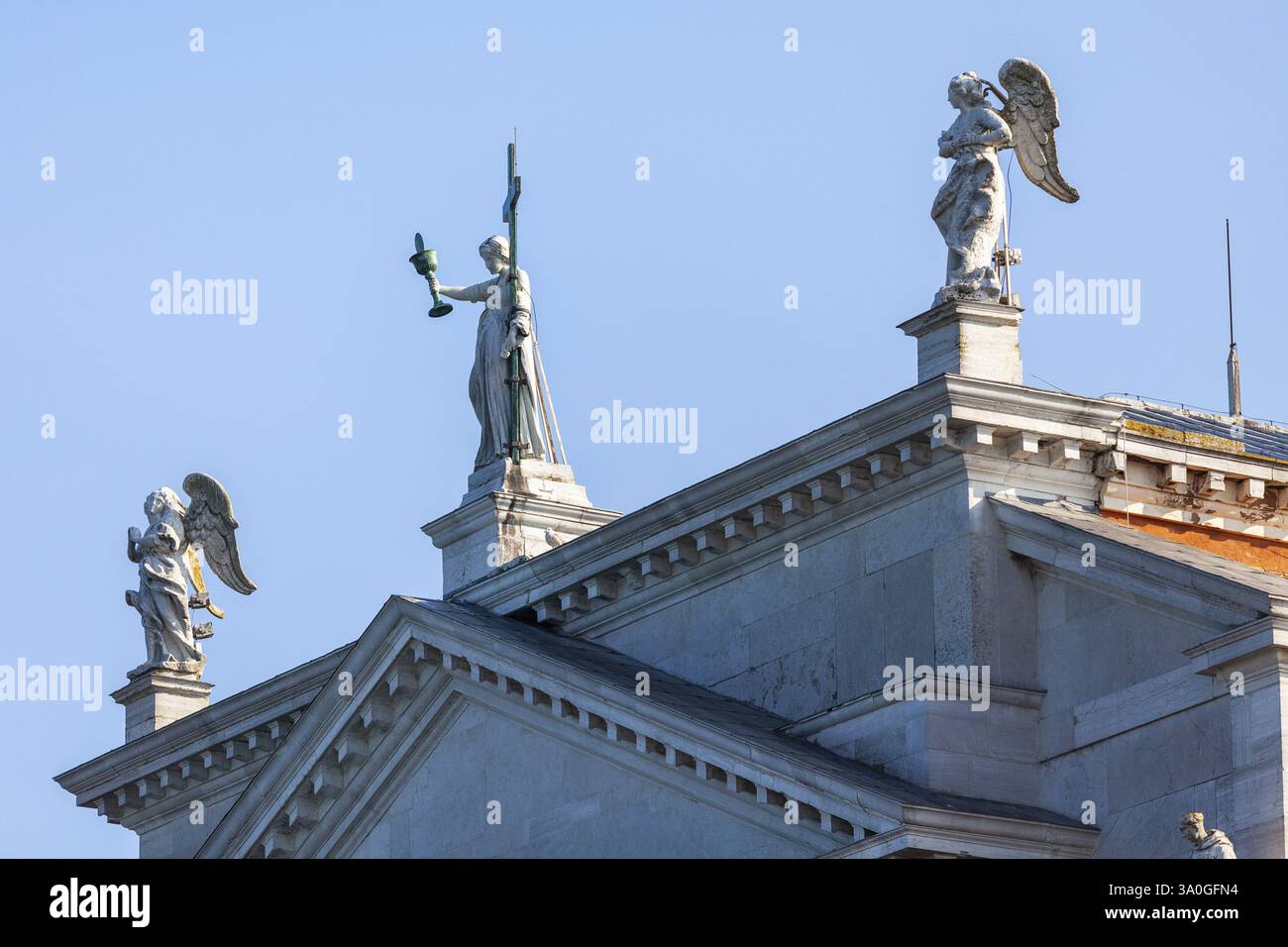 Stone sculptures, figures of saints on church facade, Chiesa del ...