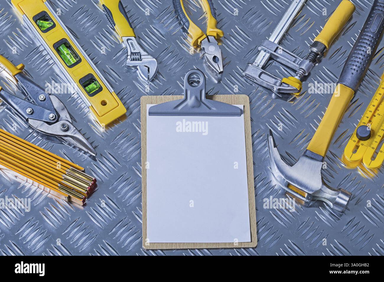 Bright version construction concept clipboard with white blank paper ...