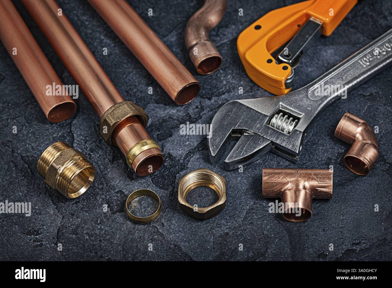 Copper Pipes And Fitting Connectors For Plumbing On Black Background ...