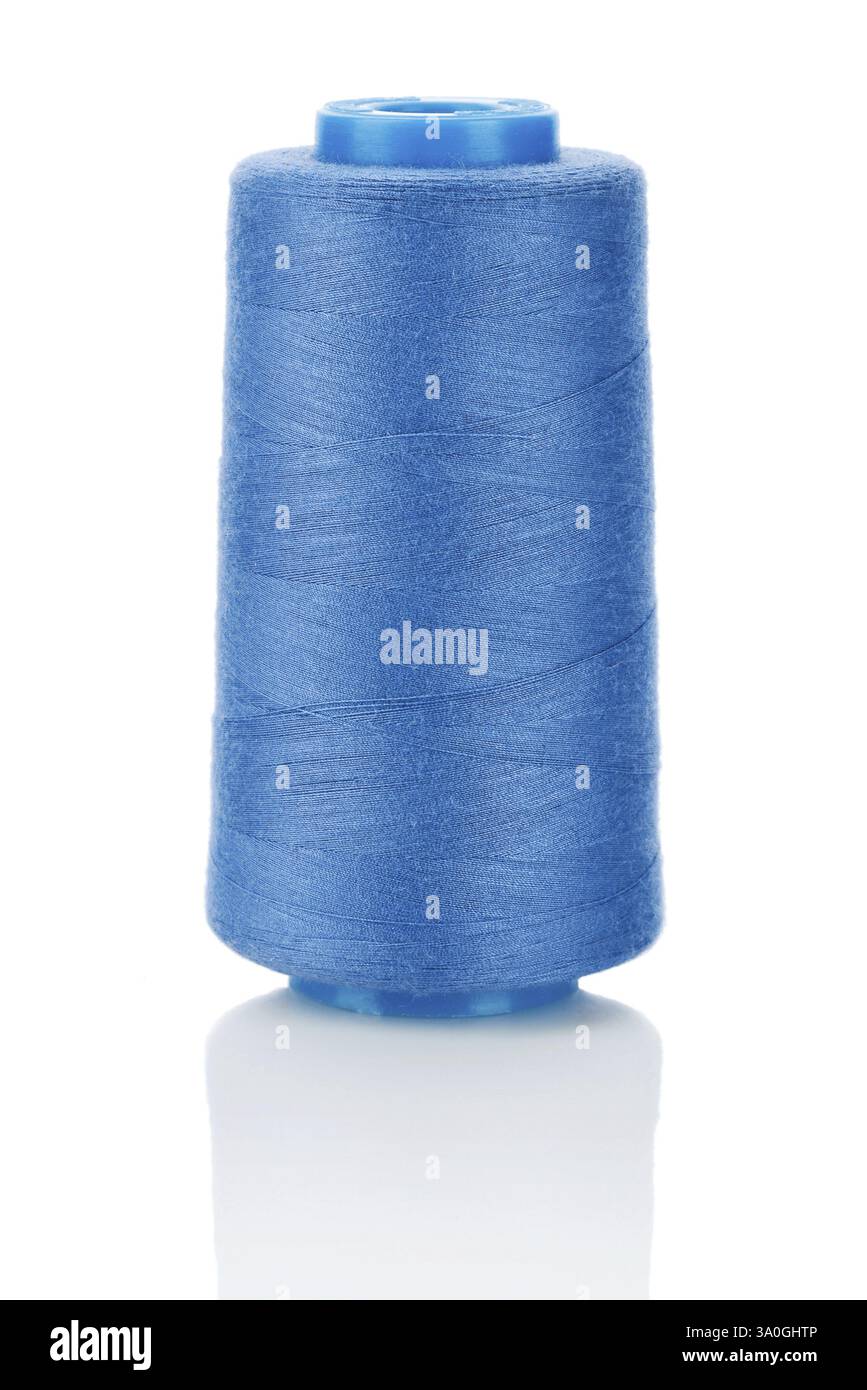 Blue thread on Bobbin Stock Photo - Alamy