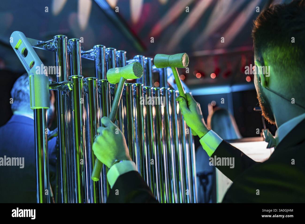 Musical instrument - tubular bells struck with a hammers during a ...