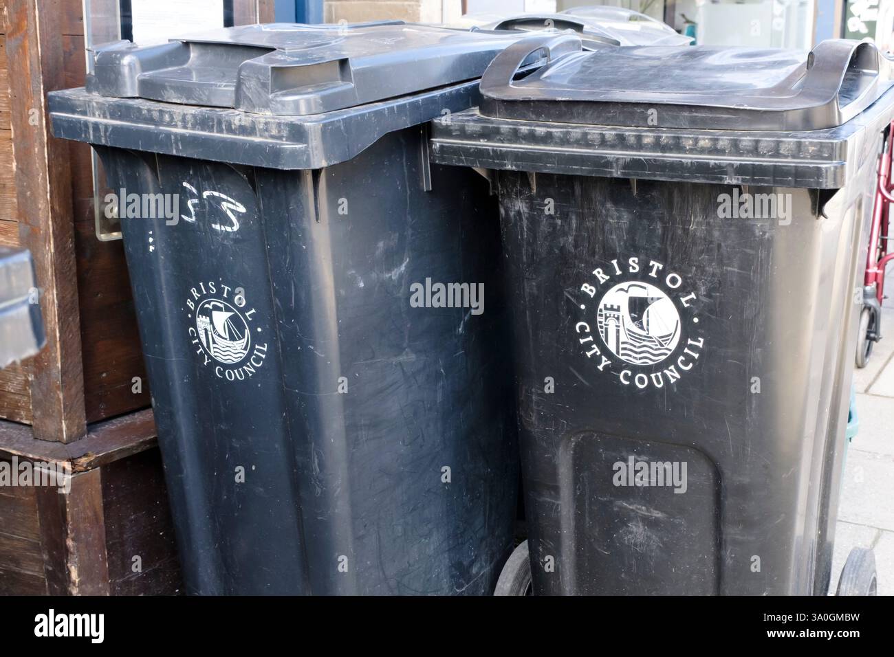 Bristol County council black bins in clifton bristol Stock Photo - Alamy