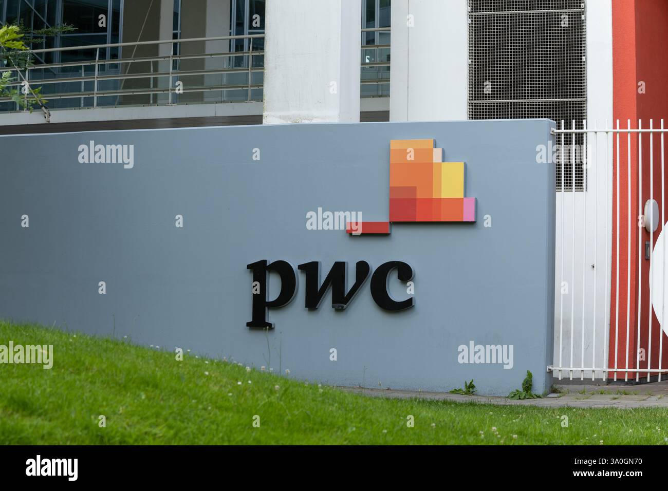 PWC logo sign. PricewaterhouseCoopers International Limited is a ...