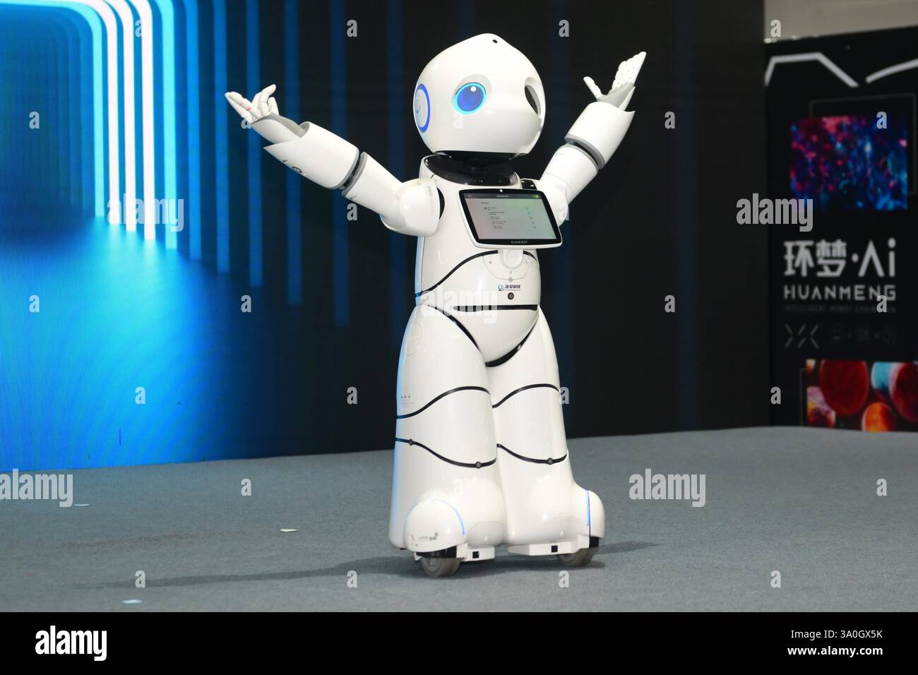 People visit an AI robot popularization exhibition in Suzhou City, east ...