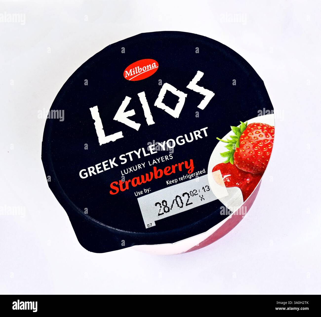 Pack of Milbona Greek Style Yoghurt. Luxury layers.Strawberry Stock Photo - Alamy