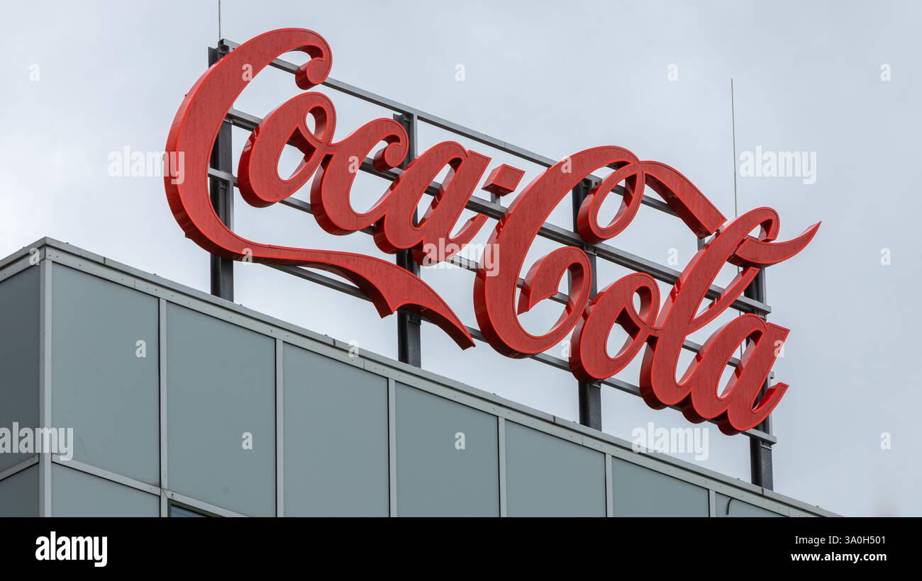Coca Cola logo sign on the roof in Rotterdam. Coca-Cola advertising ...