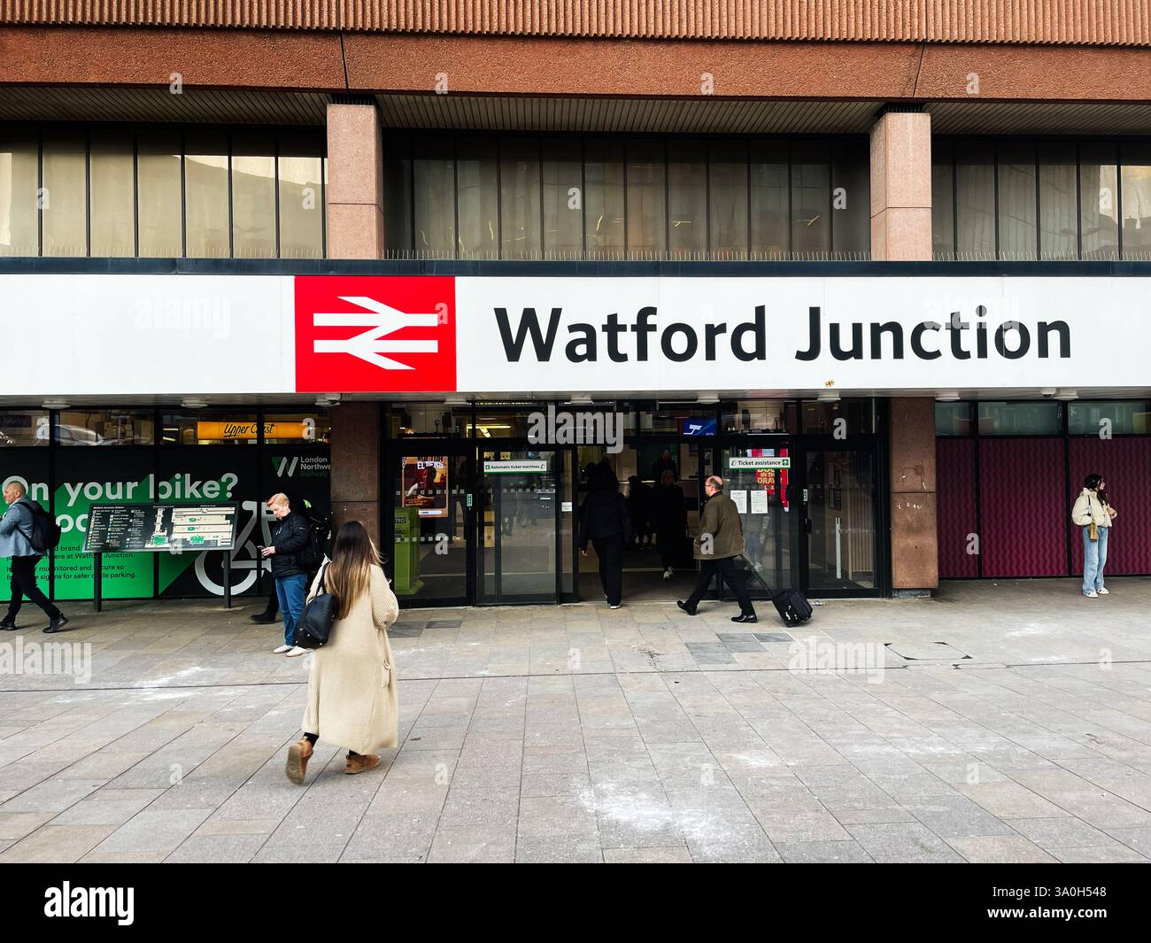 London, UK - March 02, 2025: Commuters and travelers move through the ...