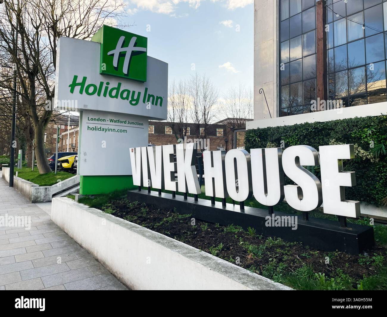 London, UK - March 02, 2025: Attractive holiday inn signage with ...