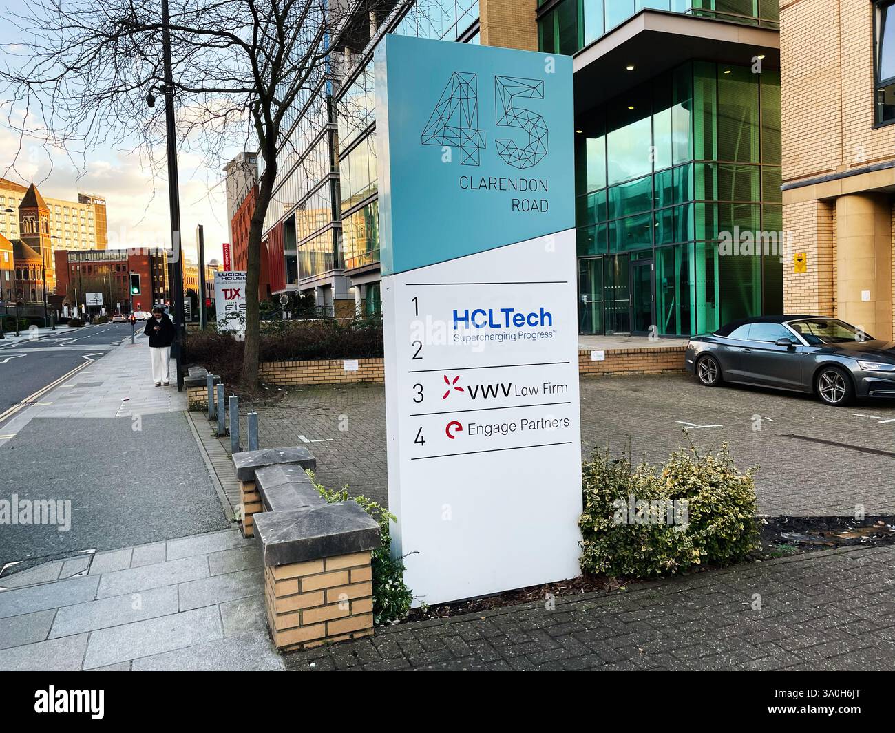 London, UK - March 02, 2025: Business building entrance with signage ...