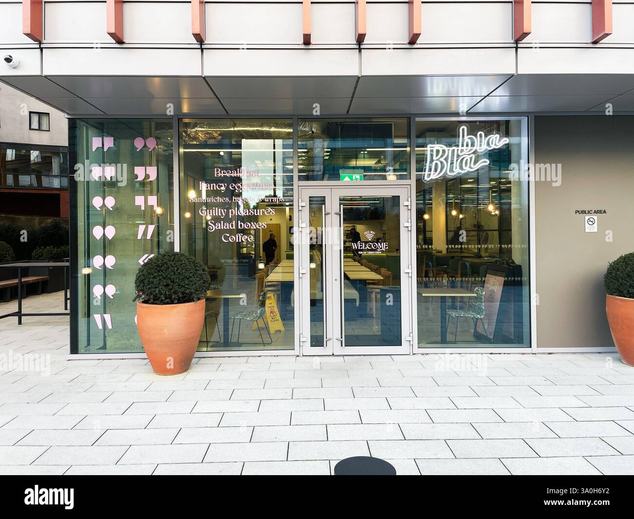 London, UK - March 02, 2025: A contemporary Bla Bla coffee shop exterior with glass windows and ...