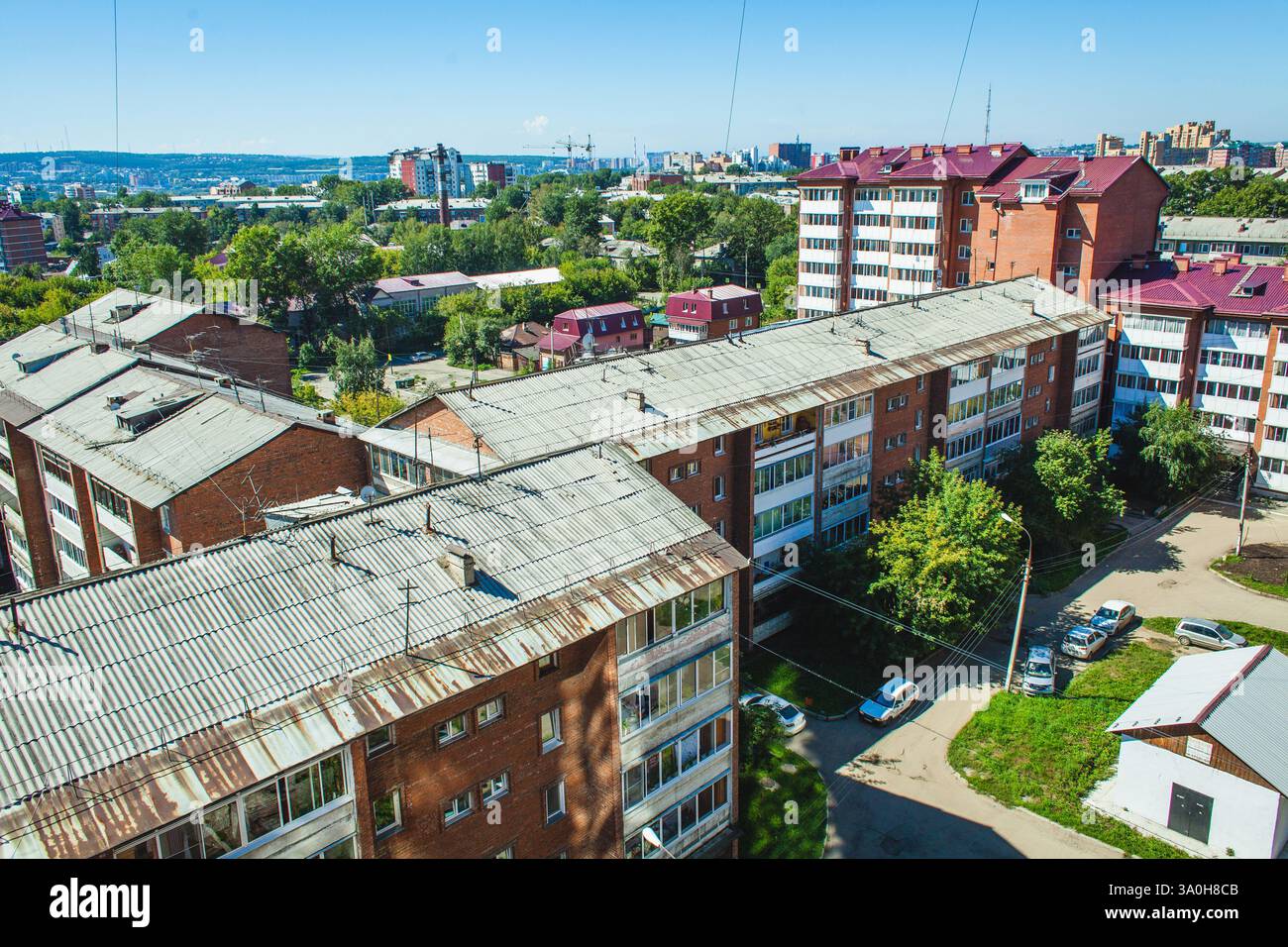 A view of residential buildings in an urban neighborhood, showcasing ...