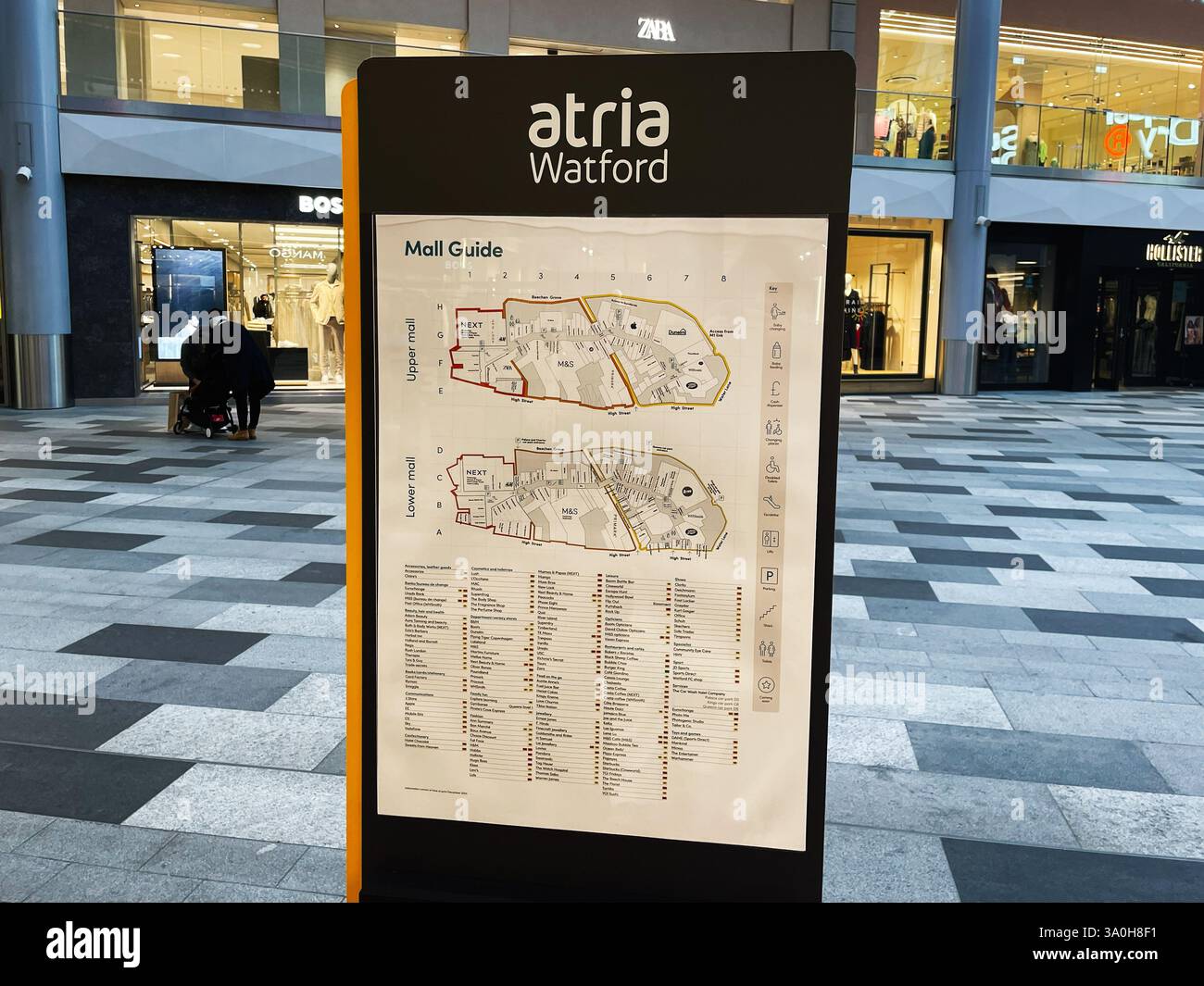 London, UK - March 02, 2025: Public shopping directory map at atria Watford showing stores and ...