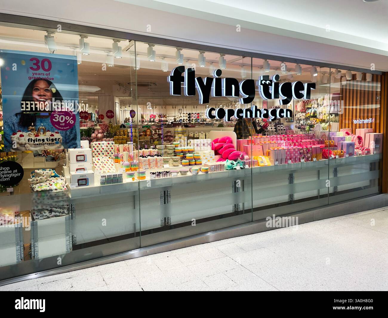 London, UK - March 02, 2025: Glass window storefront showcasing Flying ...
