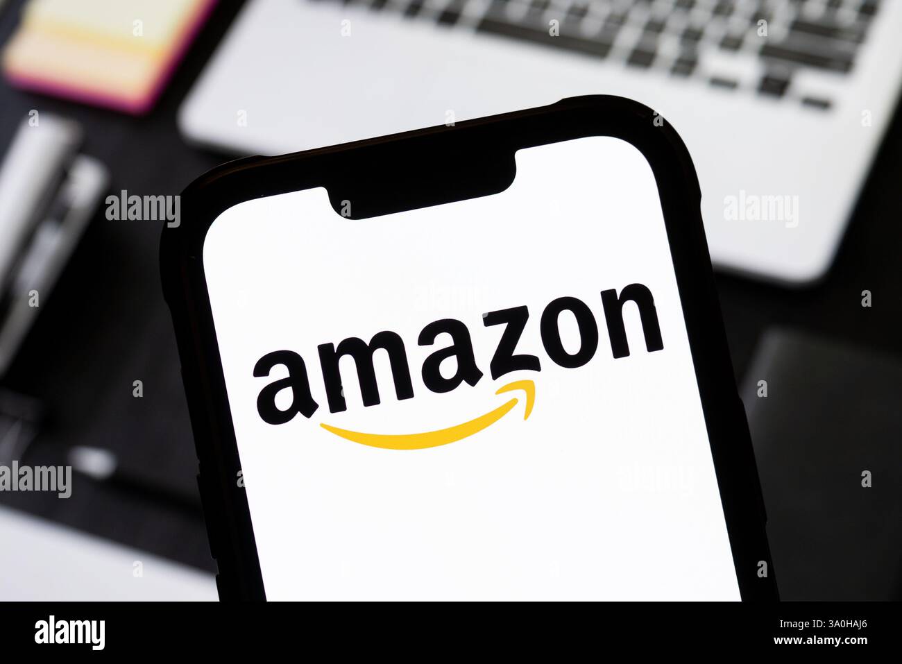 In this photo illustration, a Amazon logo is seen displayed on a smartphone. (Photo by Mateusz ...