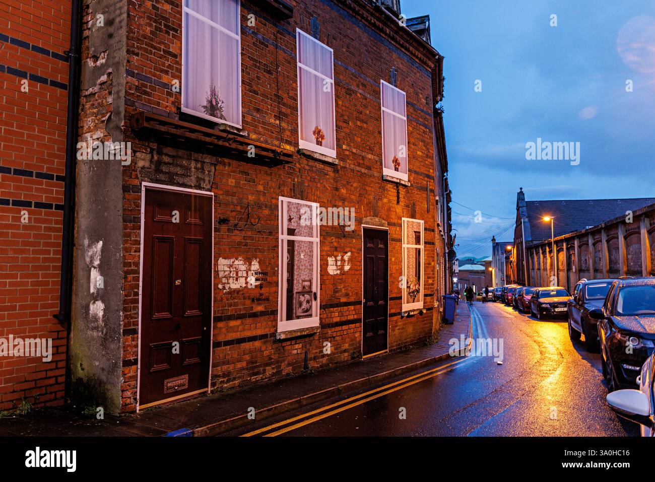 Houses with painted boards over windows, Derry, Ireland Stock Photo - Alamy