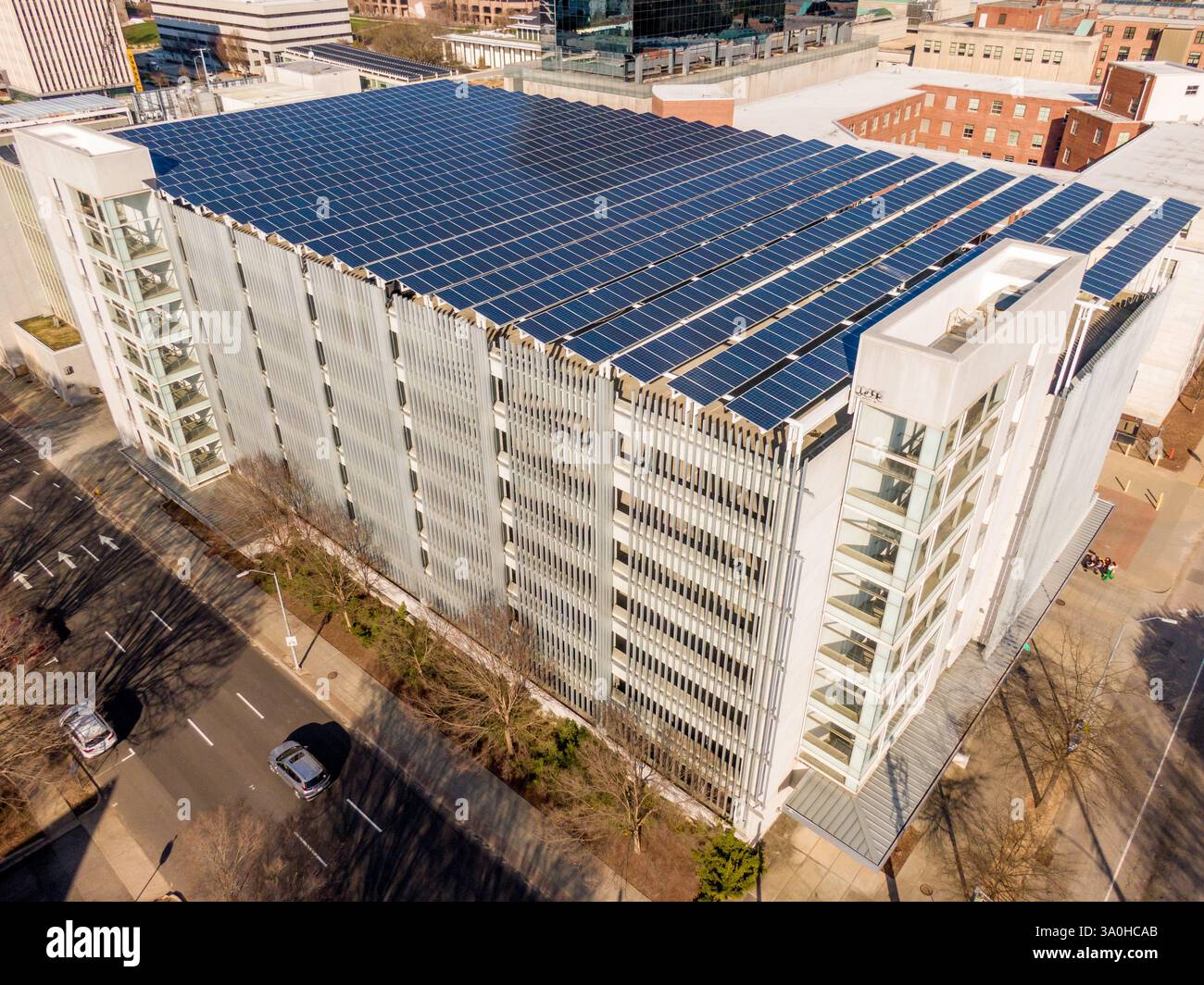 Sunny Daytime Drone Images Of Solar Panels On A Parking Deck In ...