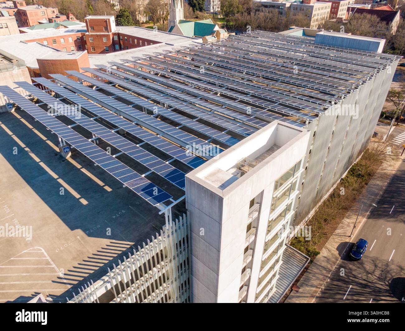Sunny Daytime Drone Images Of Solar Panels On A Parking Deck In ...