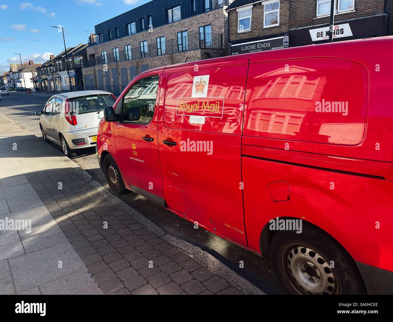 London, UK - March 02, 2025: Red Royal Mail delivery van parked on the ...