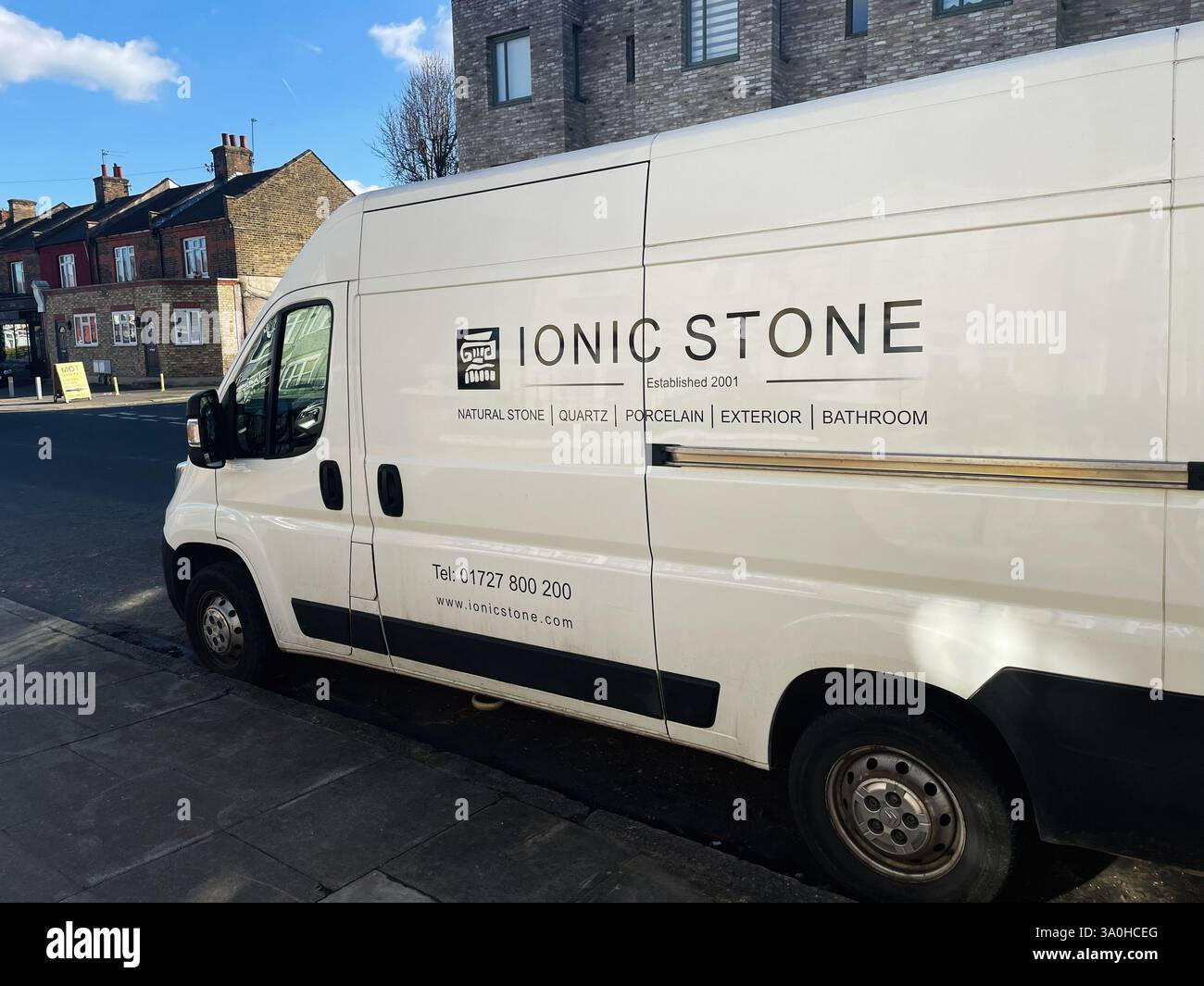 London, UK - March 02, 2025: A branded Ionic Stone white van showcases natural stone services ...