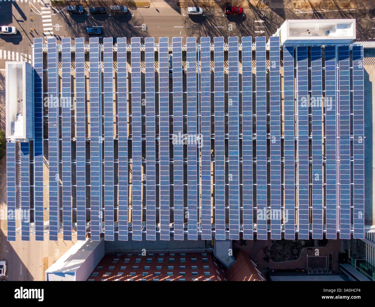 Sunny Daytime Drone Images Of Solar Panels On A Parking Deck In ...
