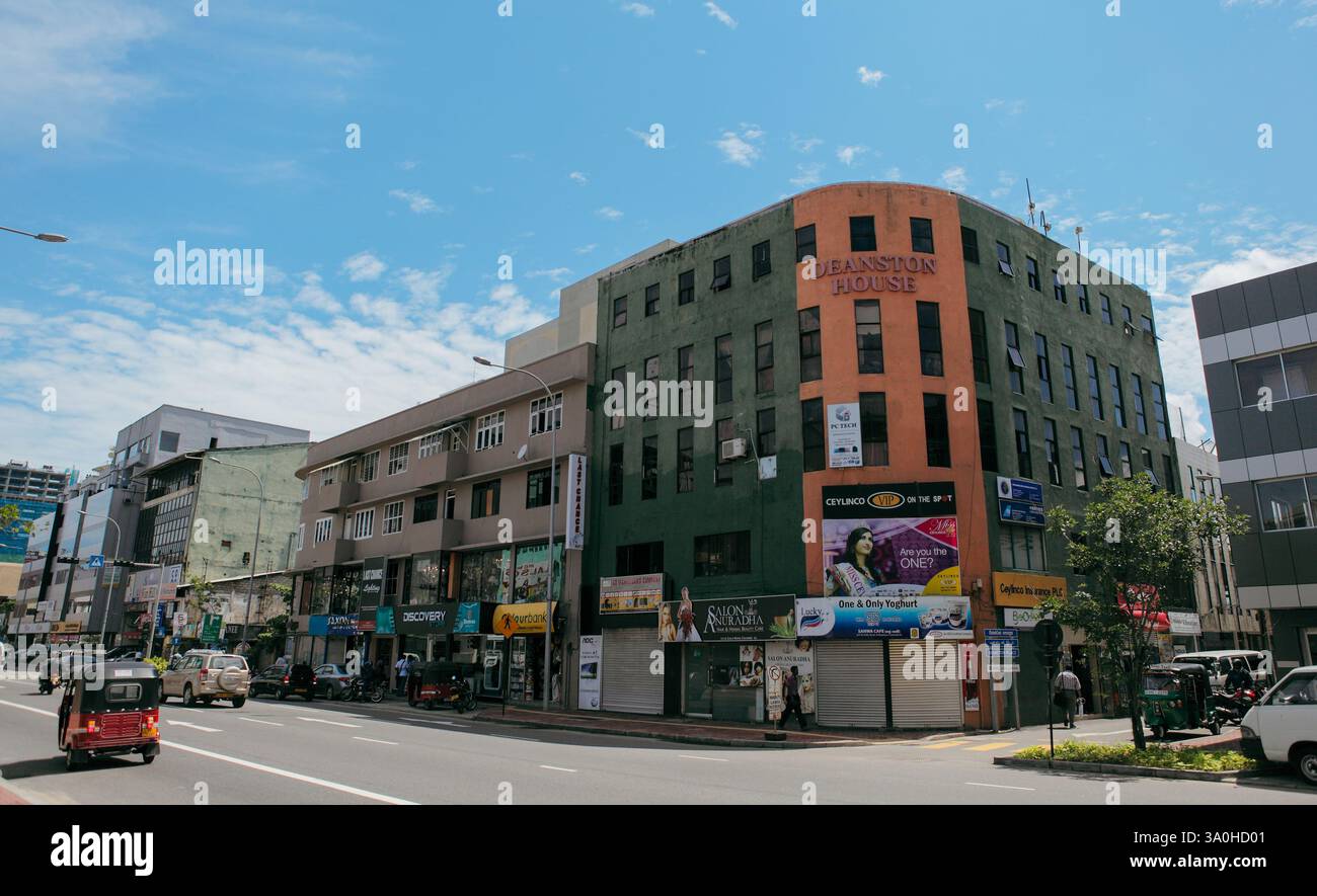 Colombo showcases a busy street with varying architecture, bustling ...
