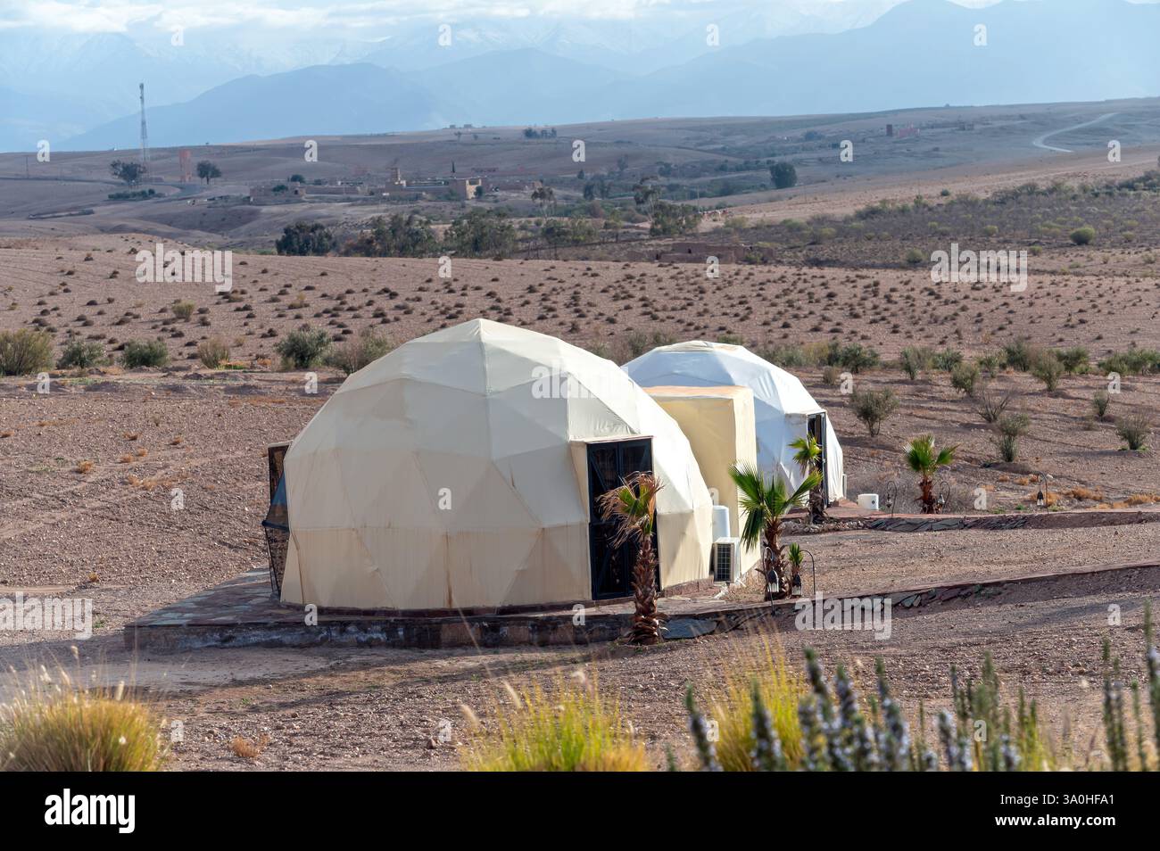 Agafay Desert, Morocco - February 16, 2025: Tourists explore unique ...