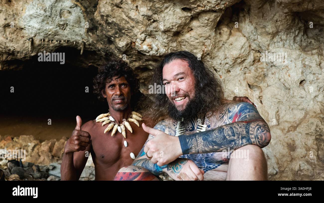 Visitor interacts with local at cave in Socotra, enjoying cultural ...