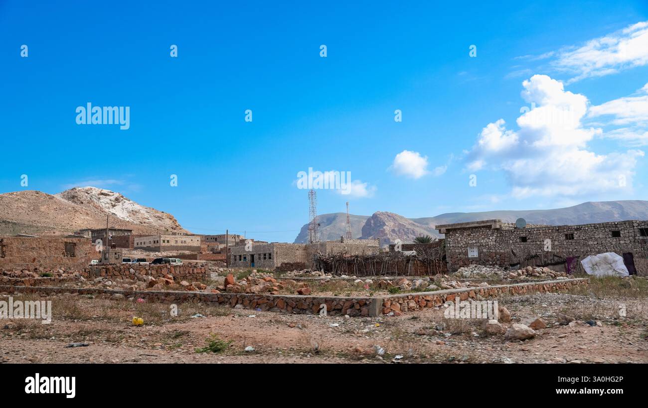 Traditional structures rise amidst the unique landscape of Socotra ...