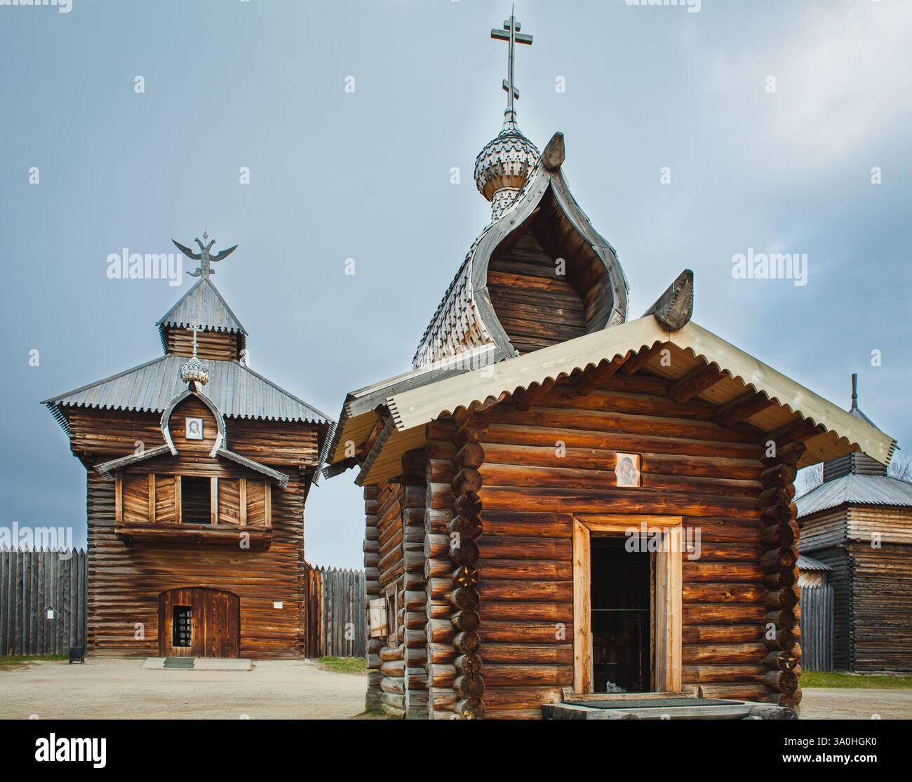 Traditional wooden chapel and adjacent building with rustic ...