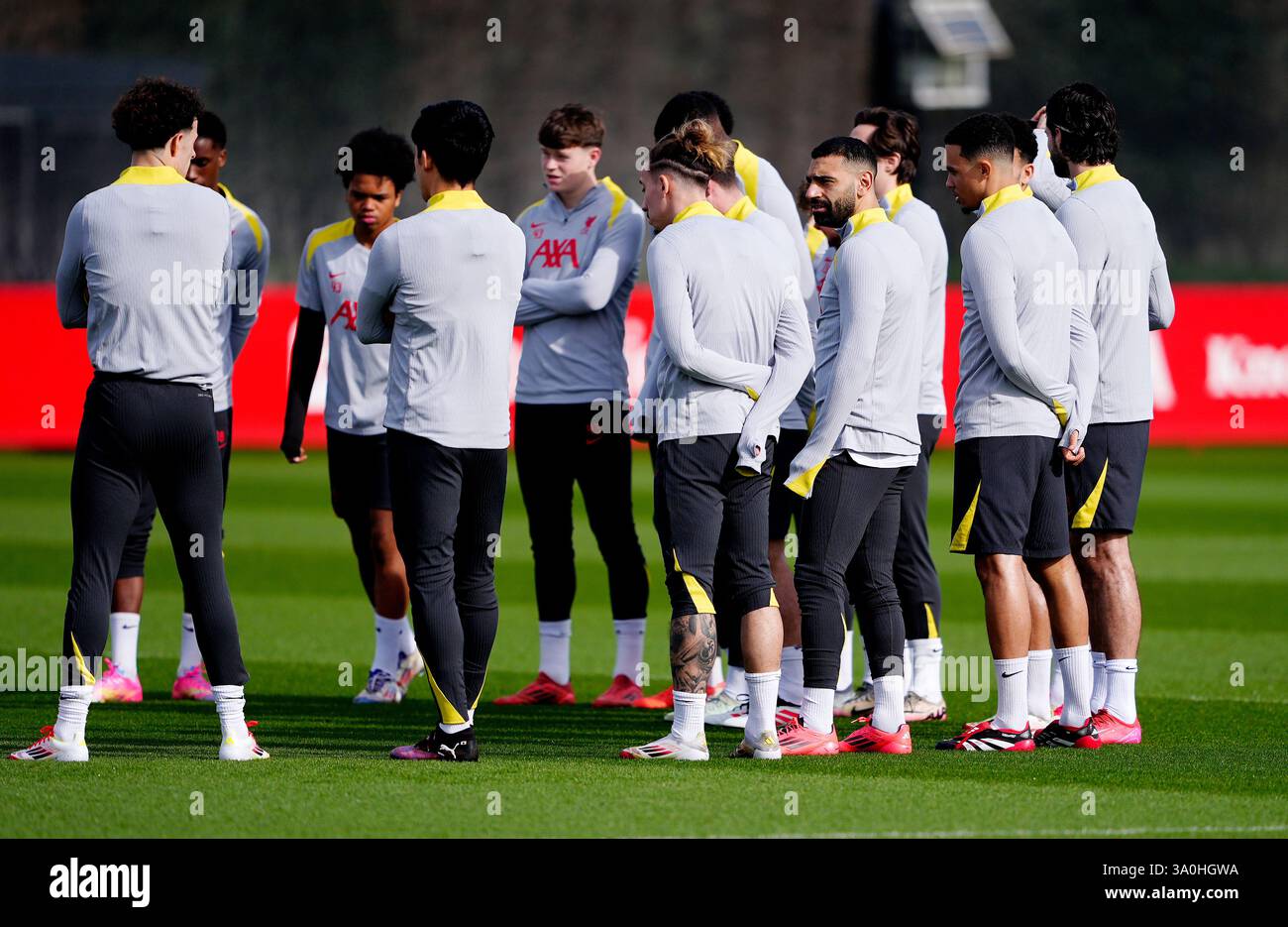 Liverpool's Mohamed Salah (centre right) and team-mates during a ...