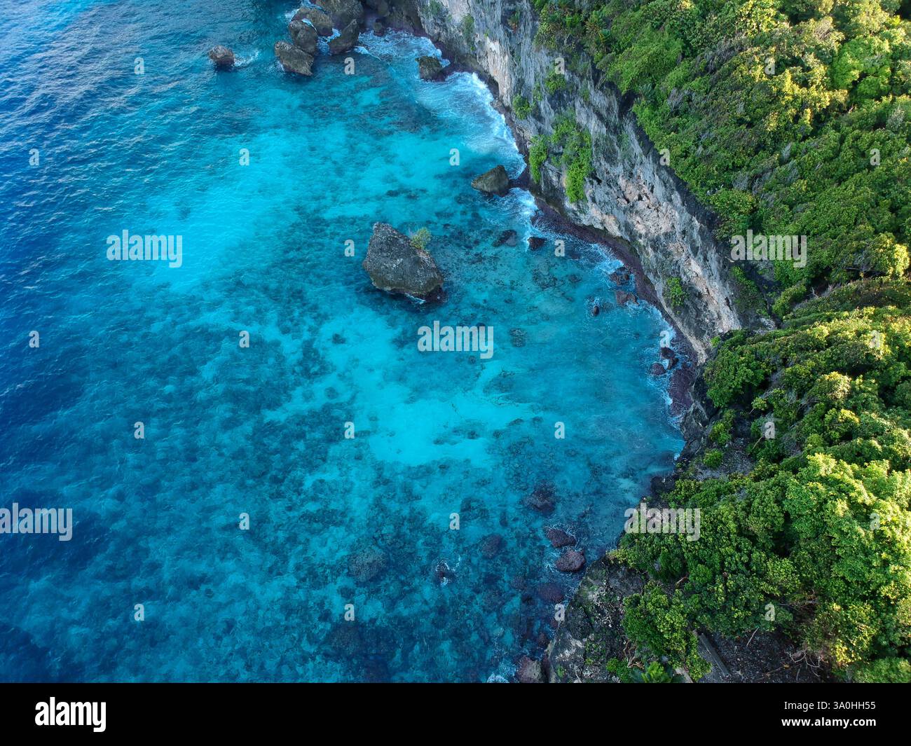 Aerial view Top down seashore. Waves crashing on rock cliff. Beautiful ...