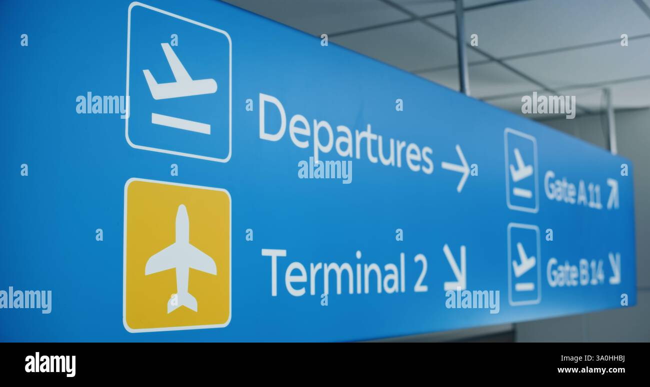 Blue Navigation Sign Directing Passengers to Departures, Terminals And ...