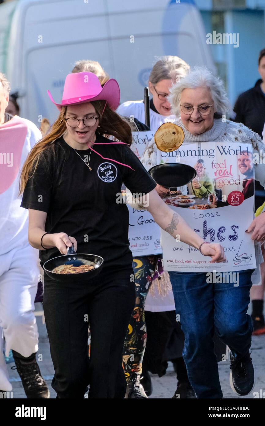 Dursley, UK. 4th Mar, 2025. The annual Shrove Tuesday Pancake Race on ...