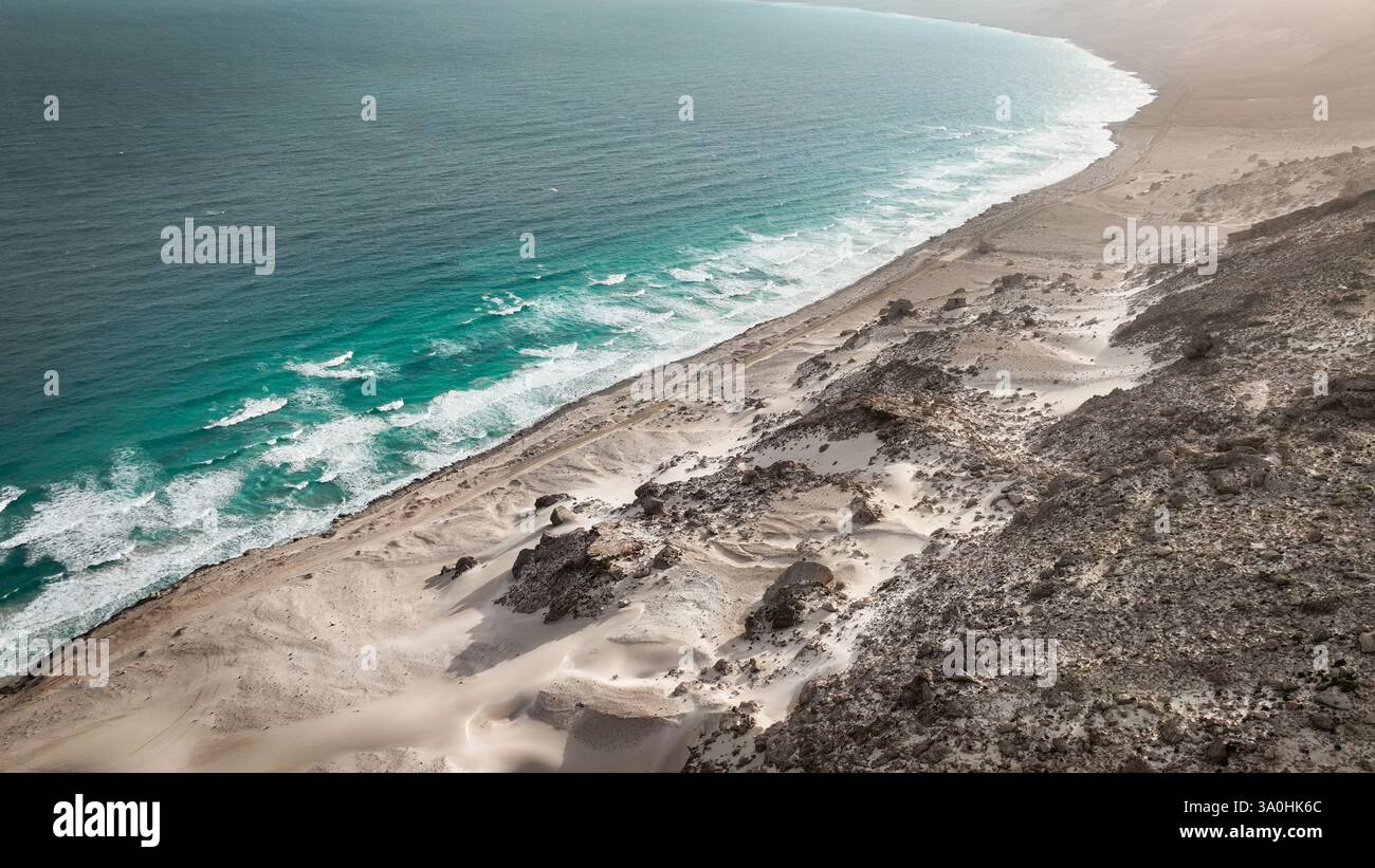 Dramatic coastal landscape of Socotra with turquoise waves crashing ...