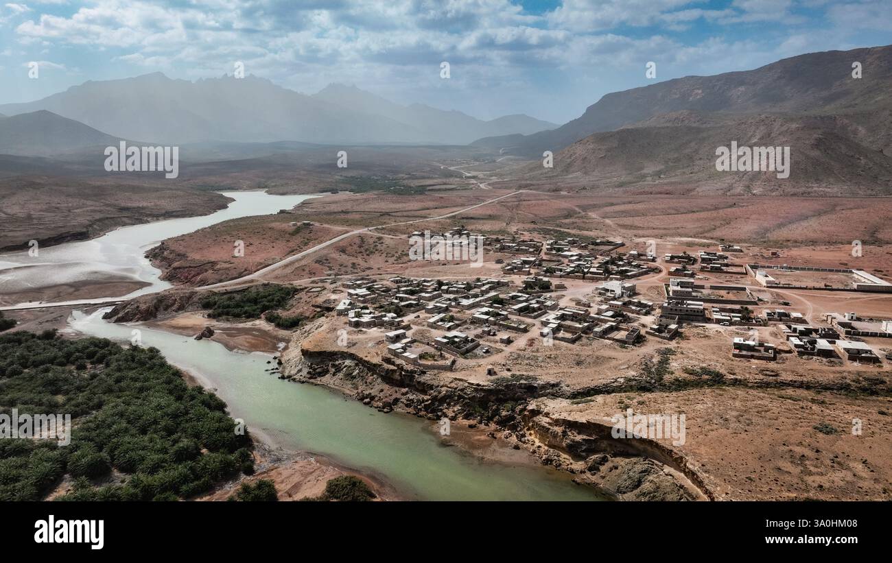 Explore the stunning Socotra landscape with a vibrant river flowing ...
