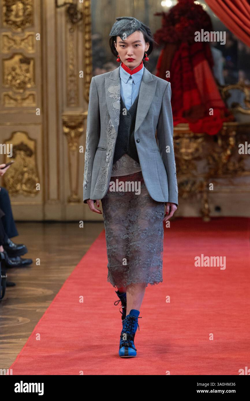 Milan, Italy. 2 Mar, 2025. A model walks the runway during the HUI ...