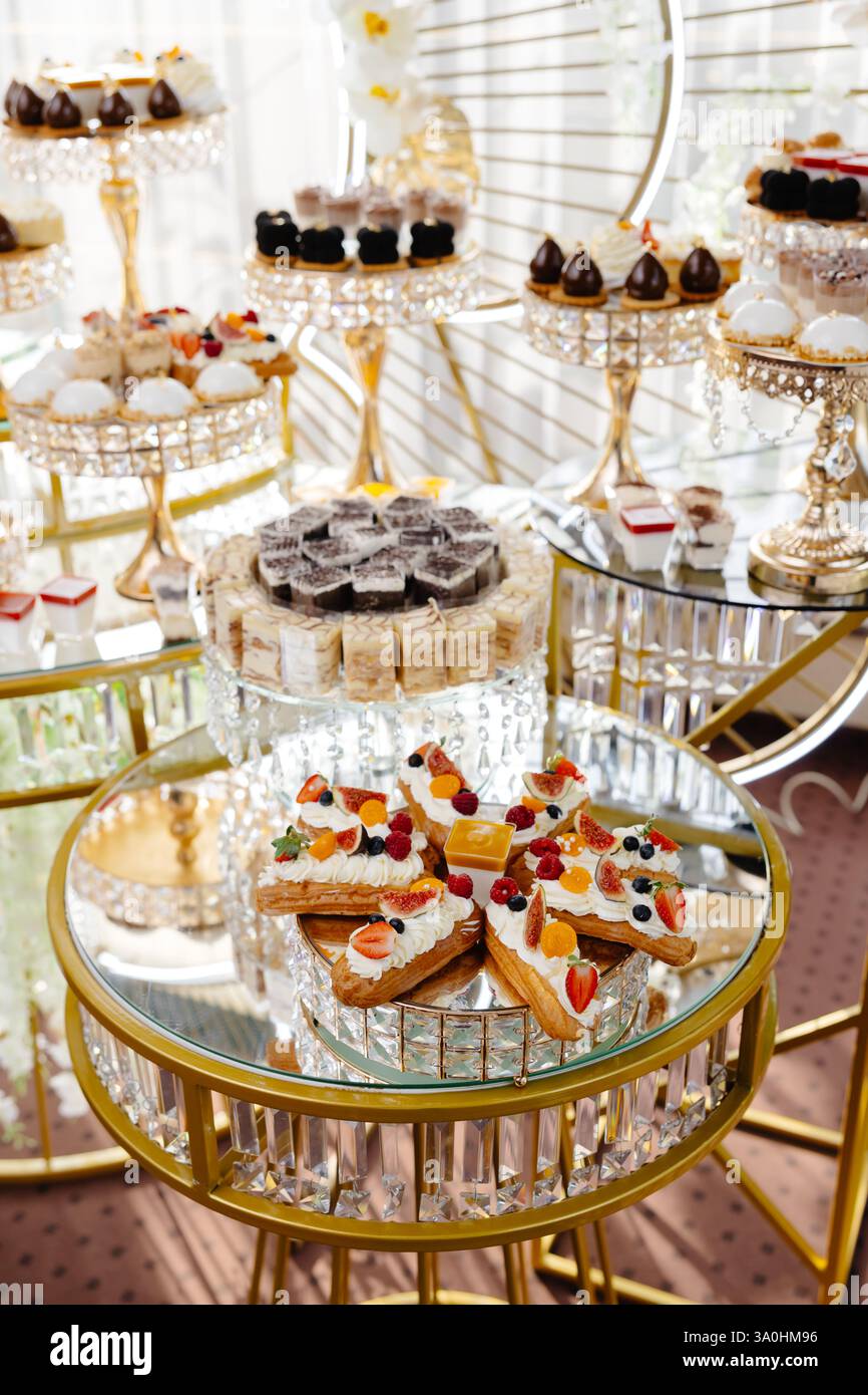 Luxurious candy bar buffet displaying a variety of delicious pastries ...