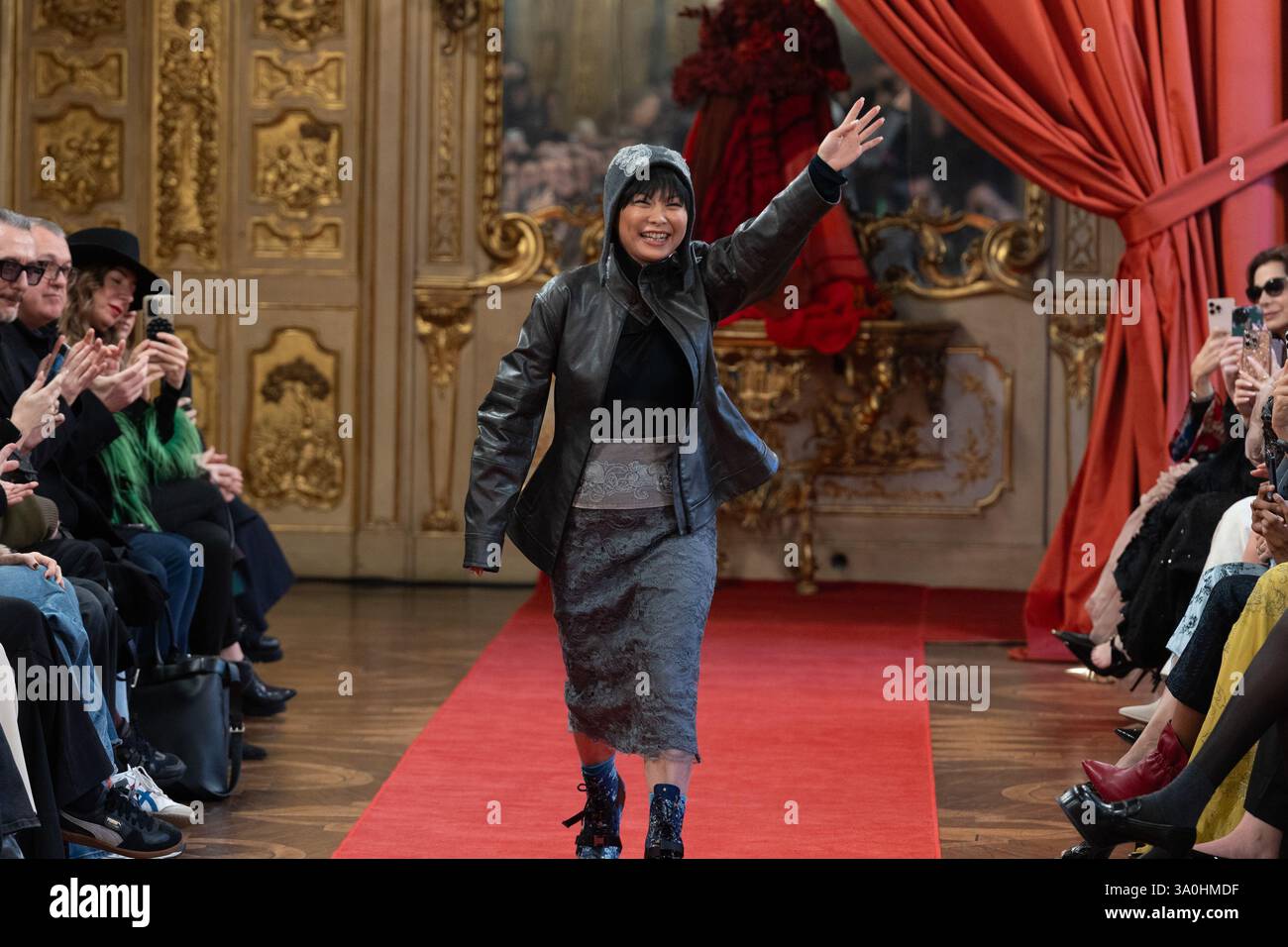 Milan, Italy. 2 Mar, 2025. Hui Zhou Zhao greets after the "Aurora" Fall ...