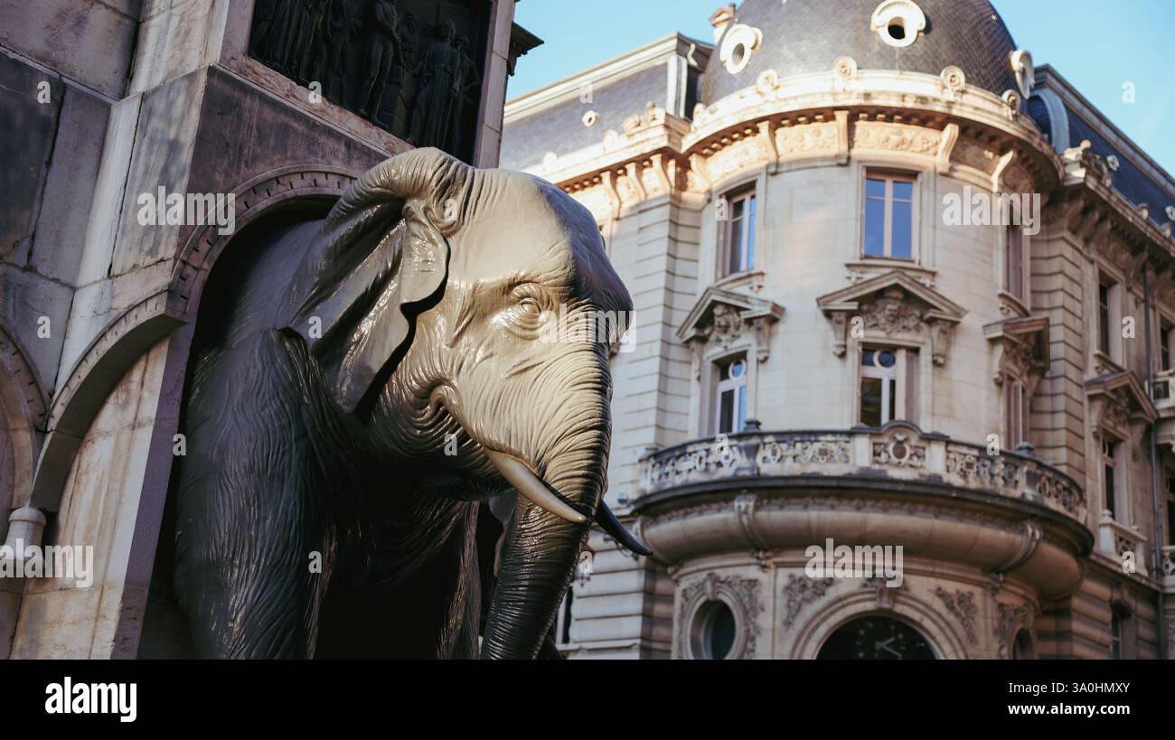 A large elephant sculpture stands majestically at the forefront of ...